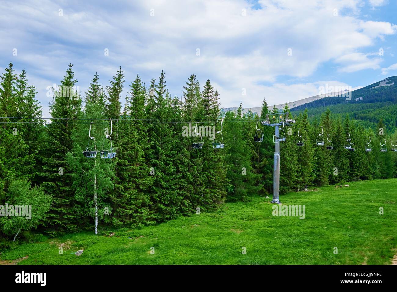 Open cable car line. Karpacz resort in Poland with lift road. Chairlift ...