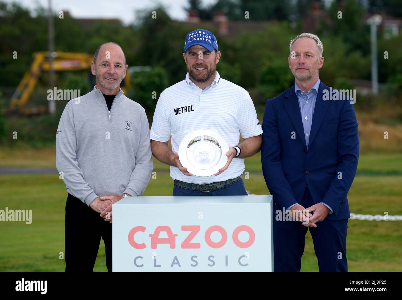 Richie Ramsay (centre) poses with the trophy after winning the Cazoo ...