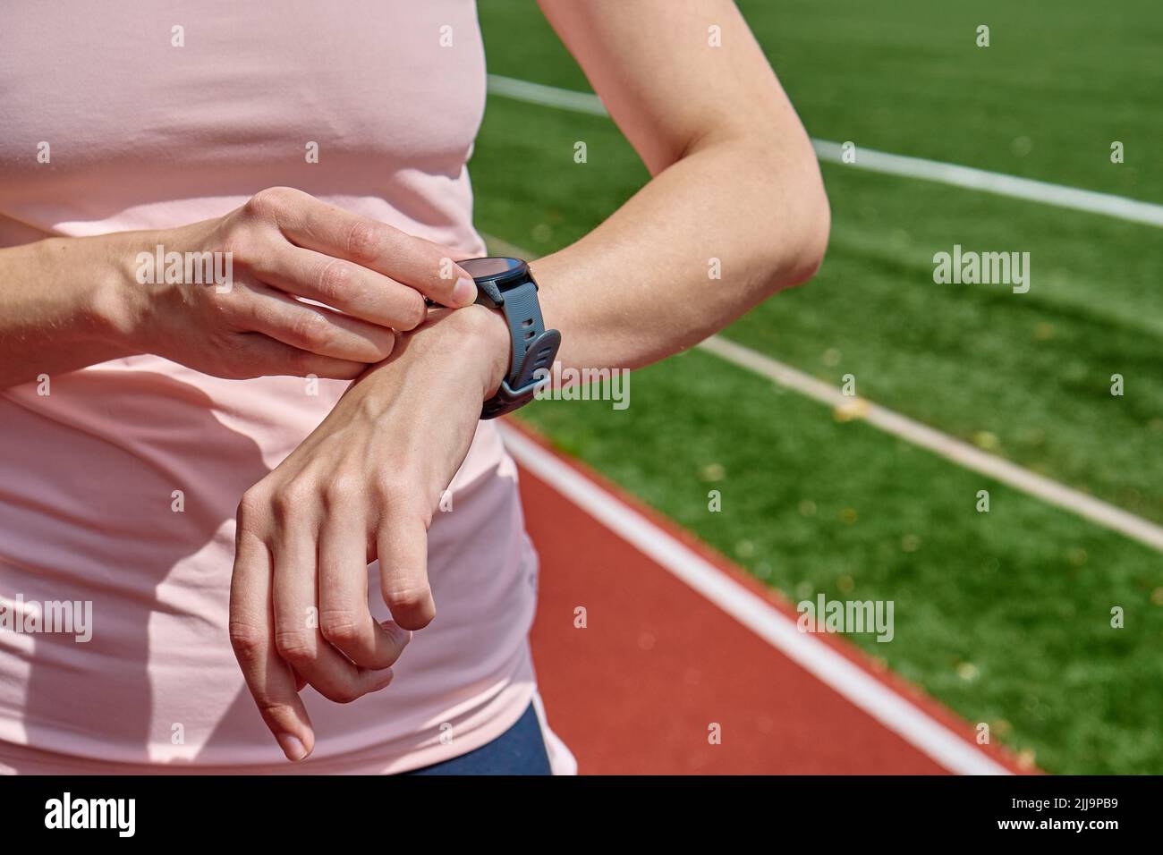 Woman use fitness watch before cardio exercises, Checking results on ...