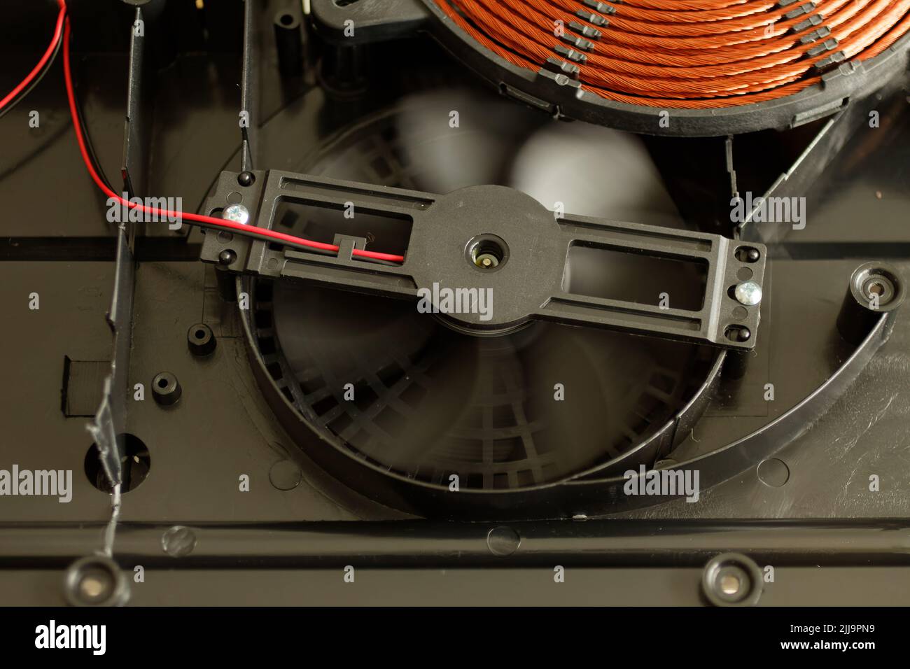 Rotating induction cooker fan, cooling the electronic and heating ...