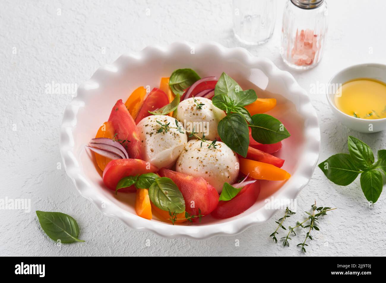 Caprese salad. Italian caprese salad with sliced tomatoes, mozzarella ...