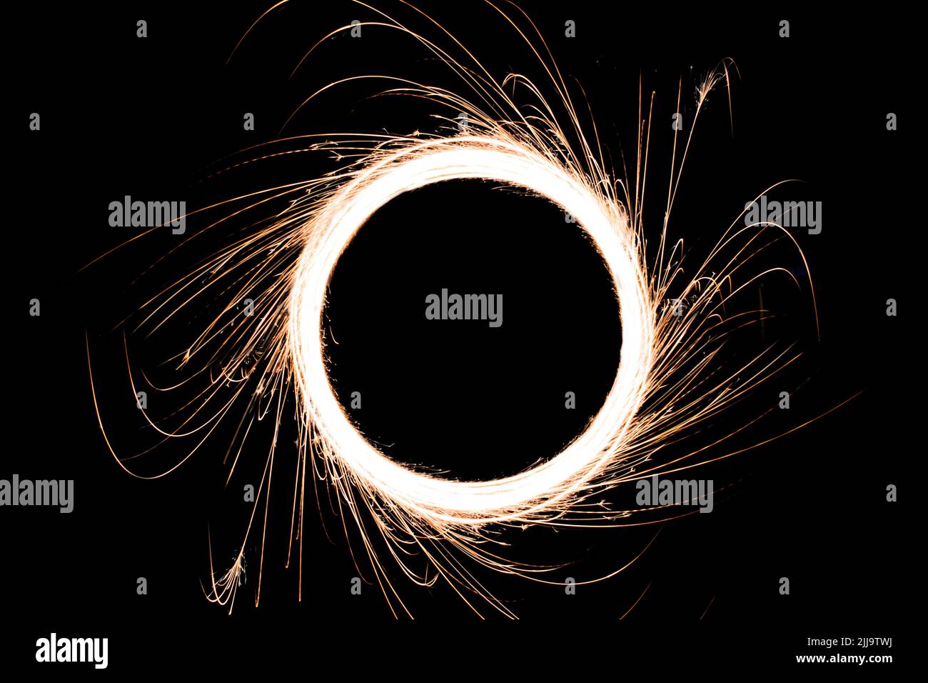 Circular sparkling light and sparks with outside Sparkles trails made ...