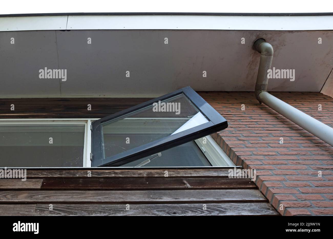 Open window on the fisrt floor of a house, getting some fresh air Stock ...