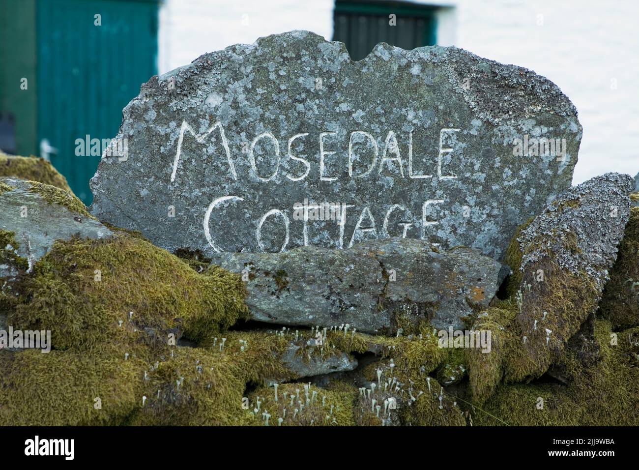 The nameplate outside Mosedale Cottage, Mosedale, in the English Lake ...