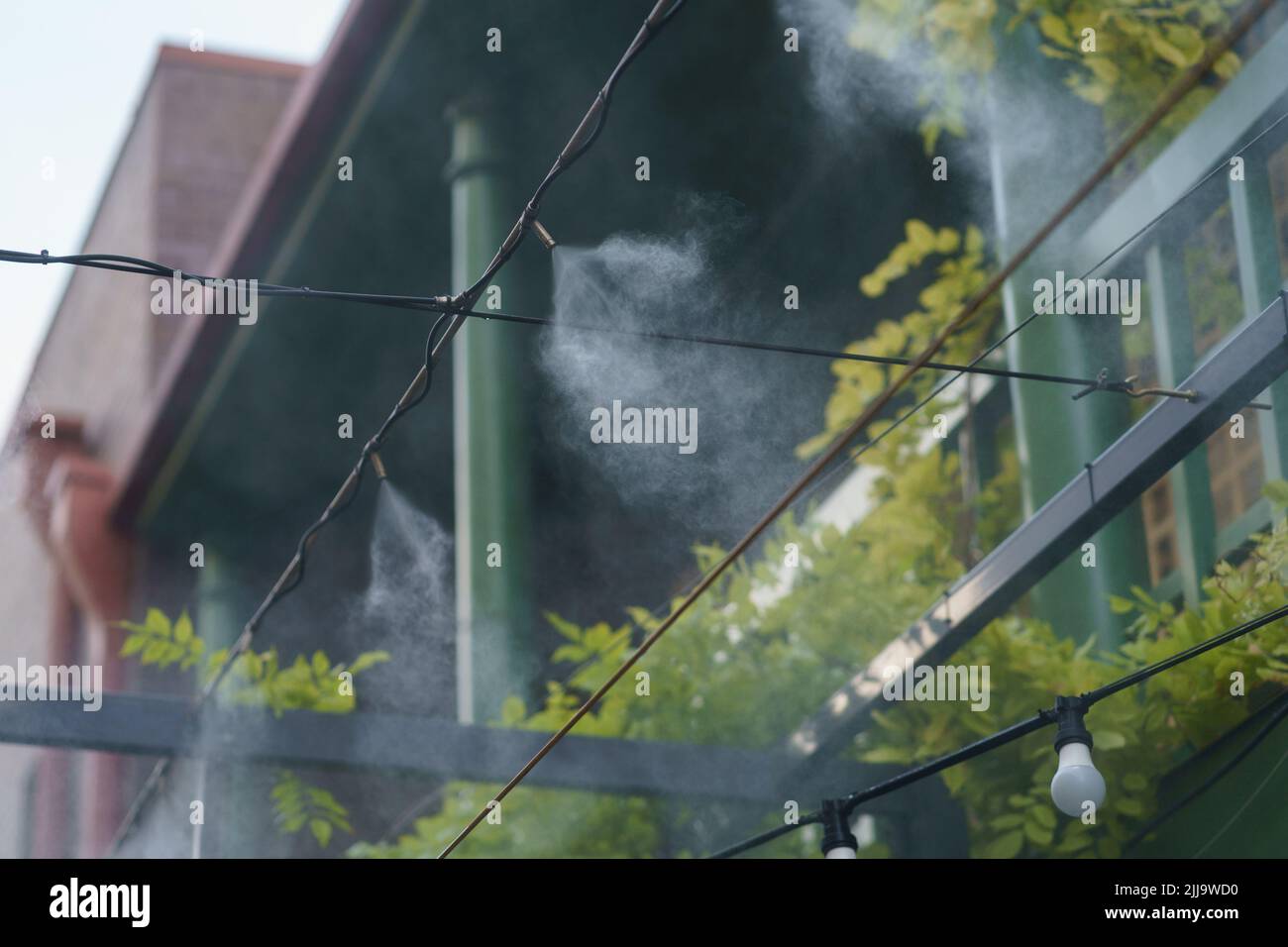 Water spray system to create a humidifier and cooling climate to reduce ...