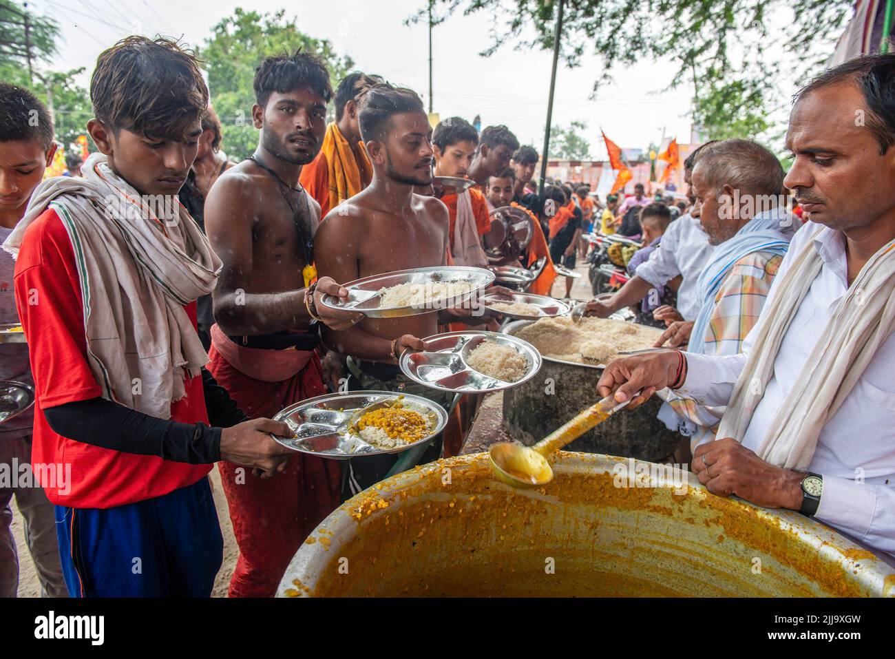 Kanwariya seen in a queue for food during the annual Kanwar Yatra ahead ...