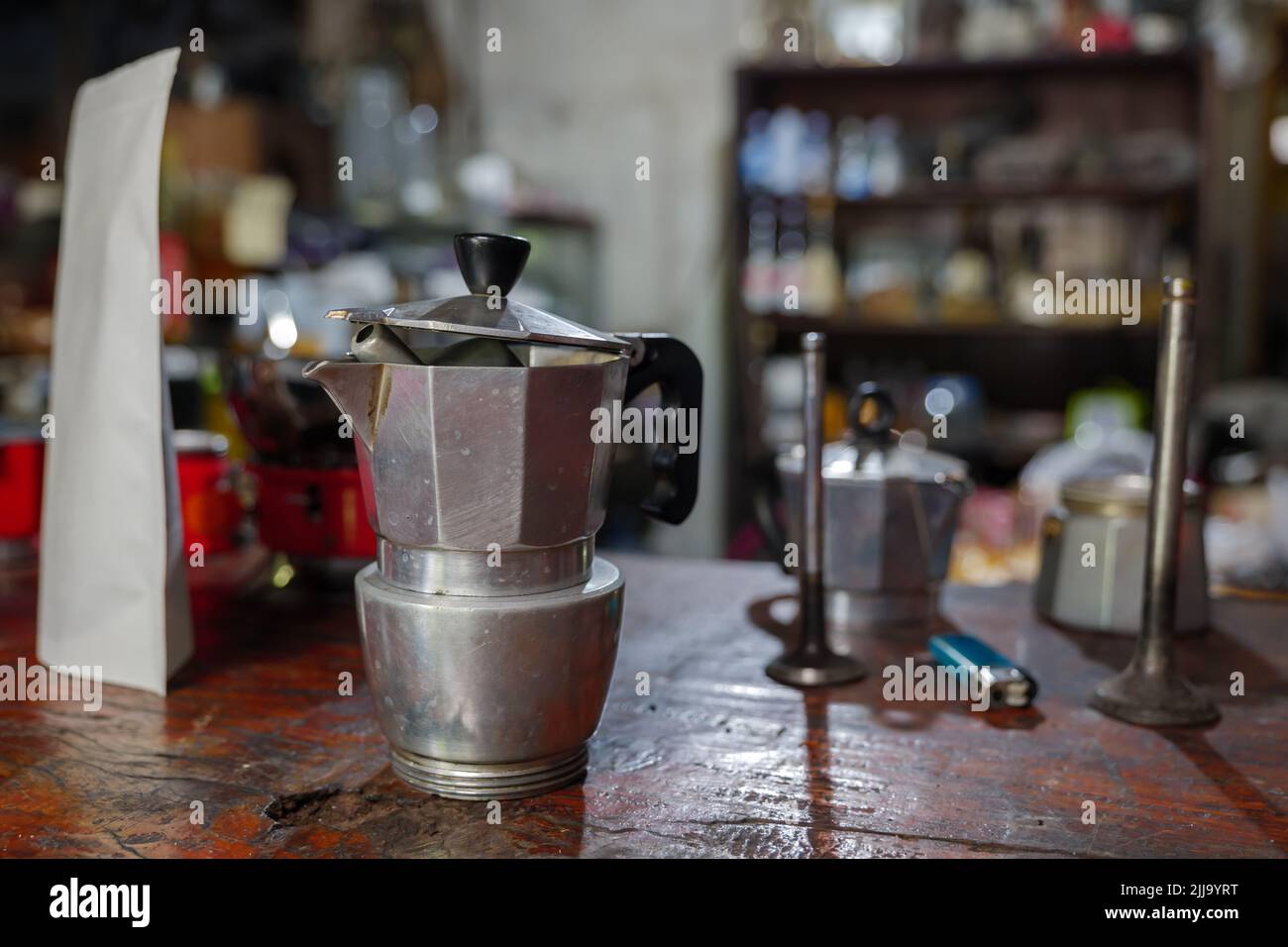 Selective focus view at Moka pot, using Moka pot to make coffee drink ...