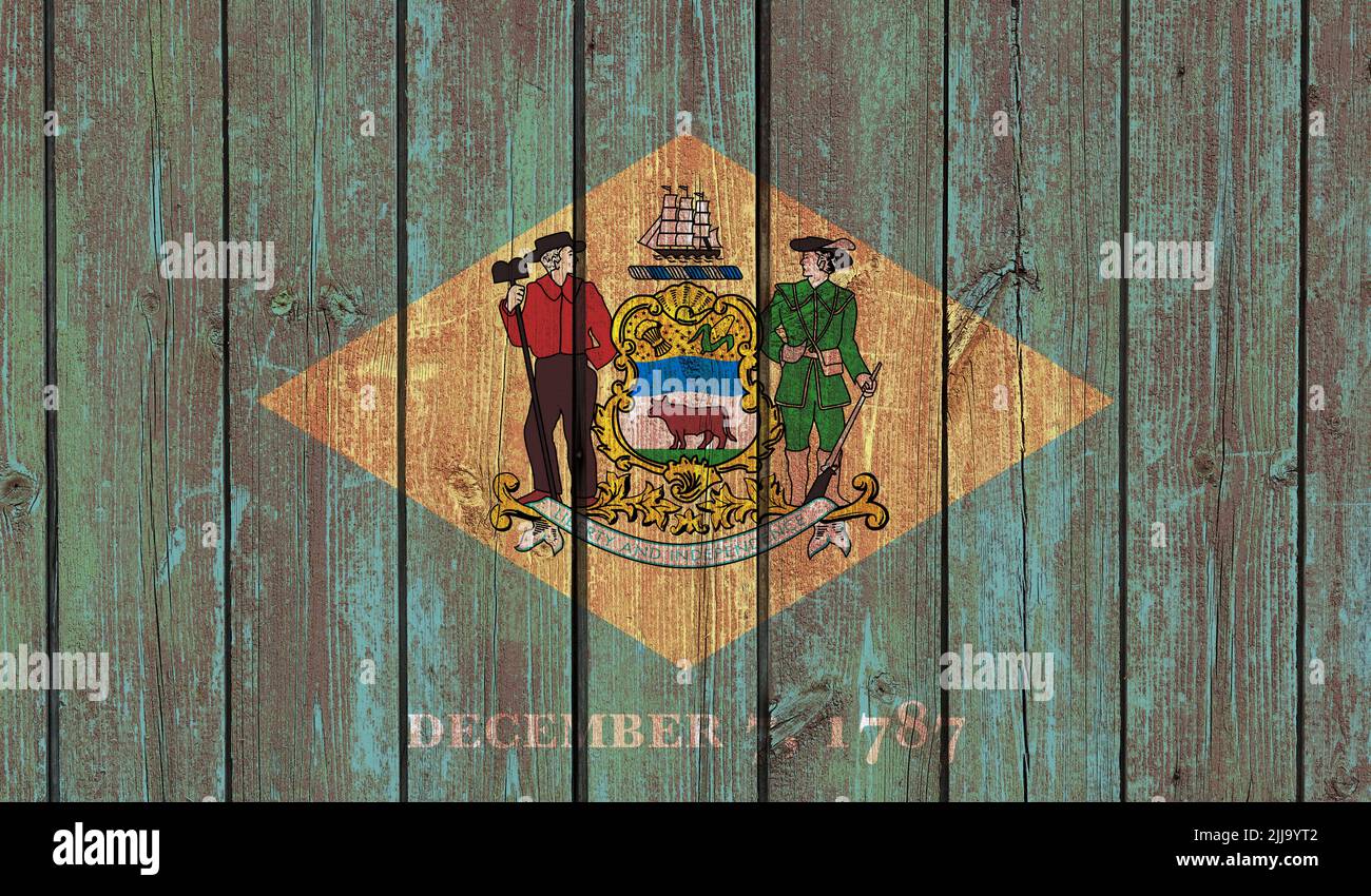 Top view of Old Painted Flag of Delaware state, USA on Dark Wooden ...