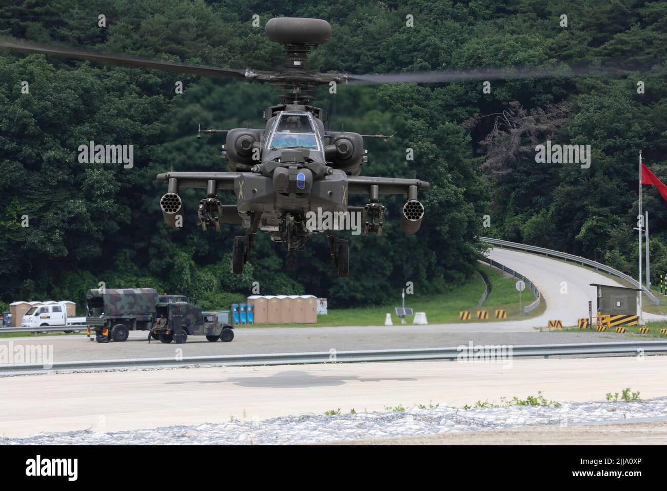 An AH-64E Apache Helicopter belonging to the 5-17 Air Cavalry Squadron ...