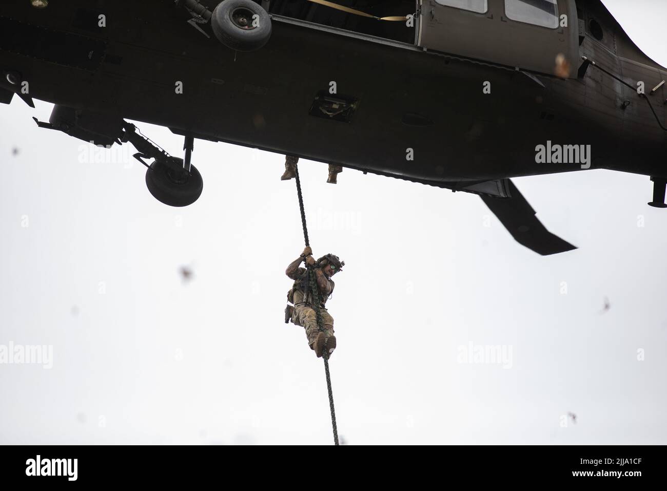 U.S. Army Special Operations Soldiers conduct fast rope insertion ...