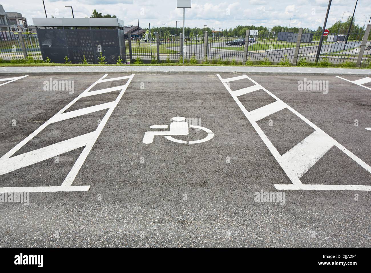 Reserved disable parking sign on the asphalt road surface Stock Photo ...
