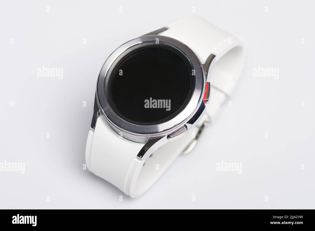 Perspective view of modern smartwatch with white bracelet isolated ...