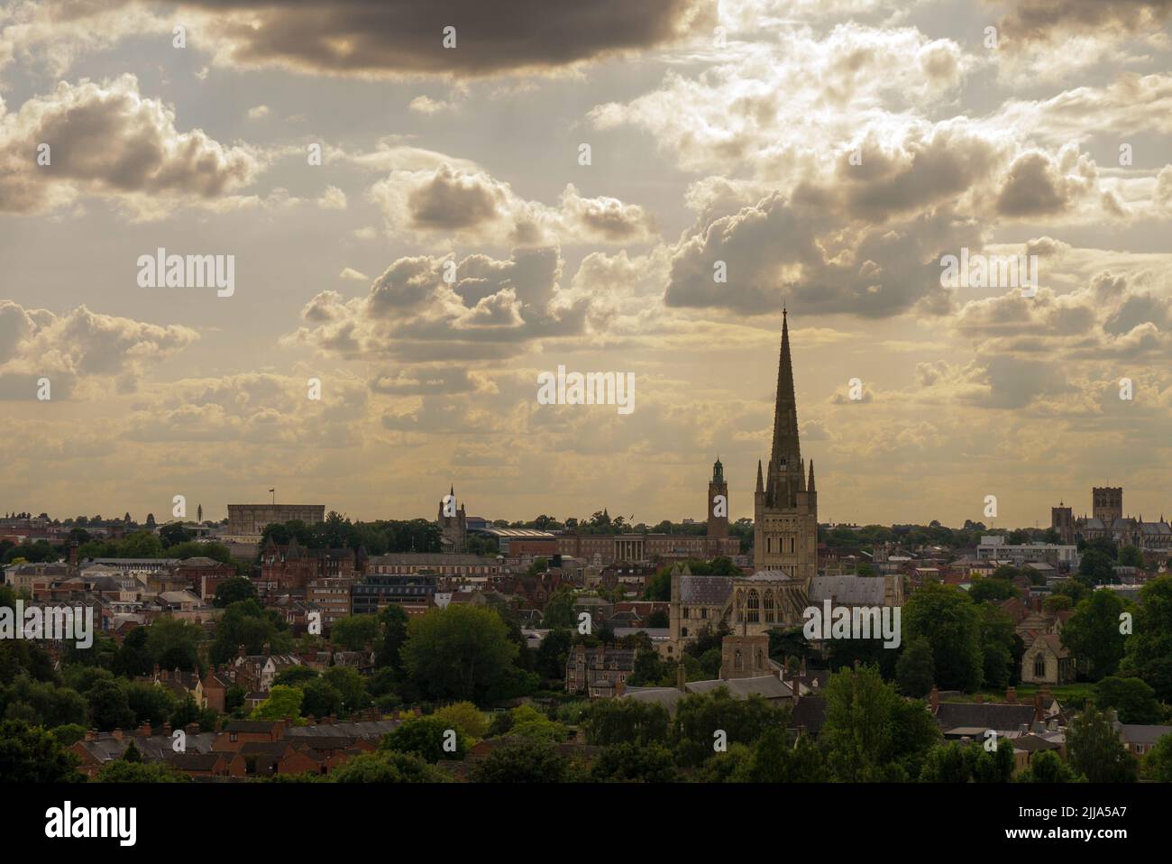 The sunset over Norwich, UK with the cathedrals, city hall and castle ...