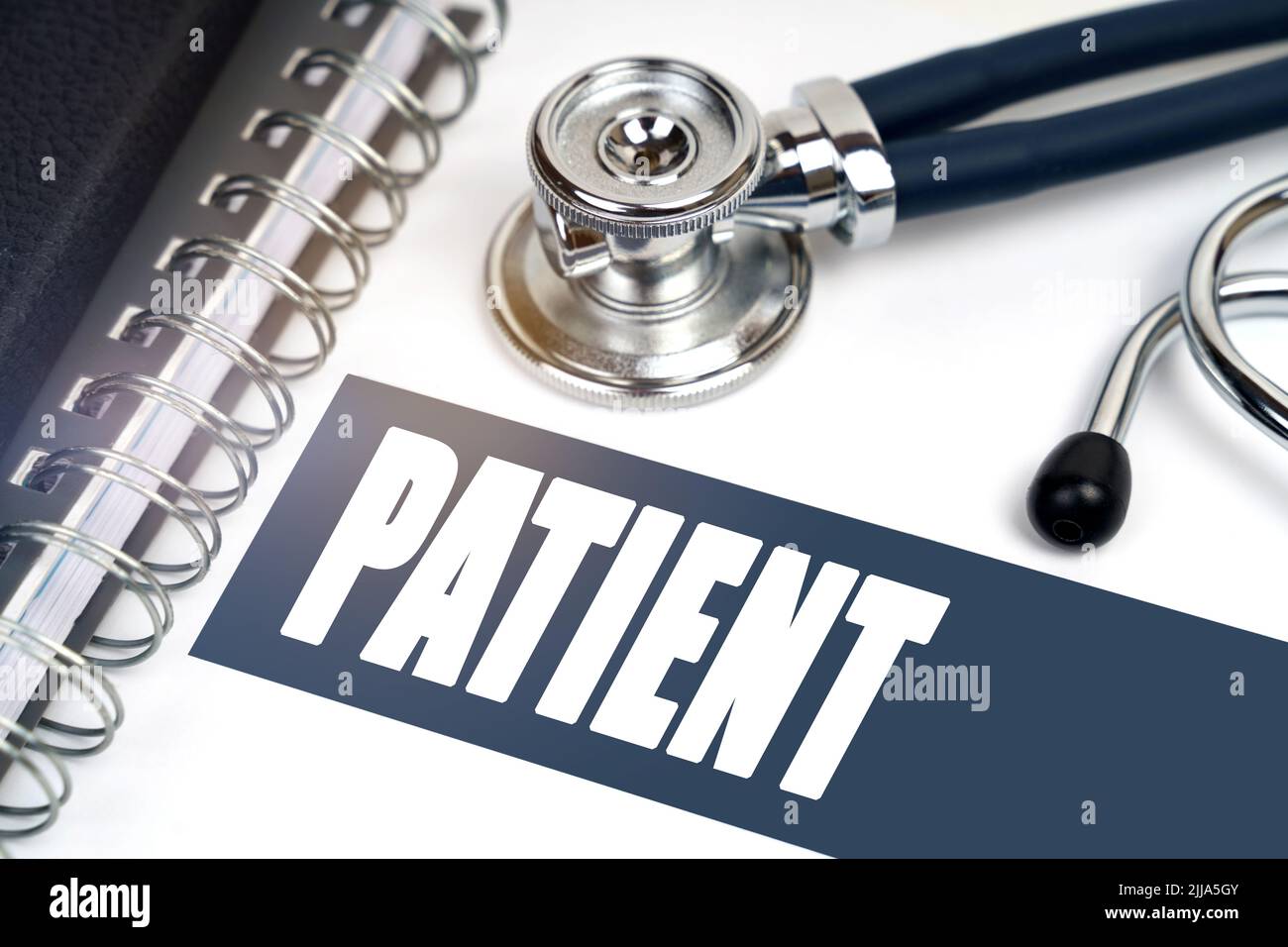 Medicine concept. On the table are a stethoscope and a notebook, next ...