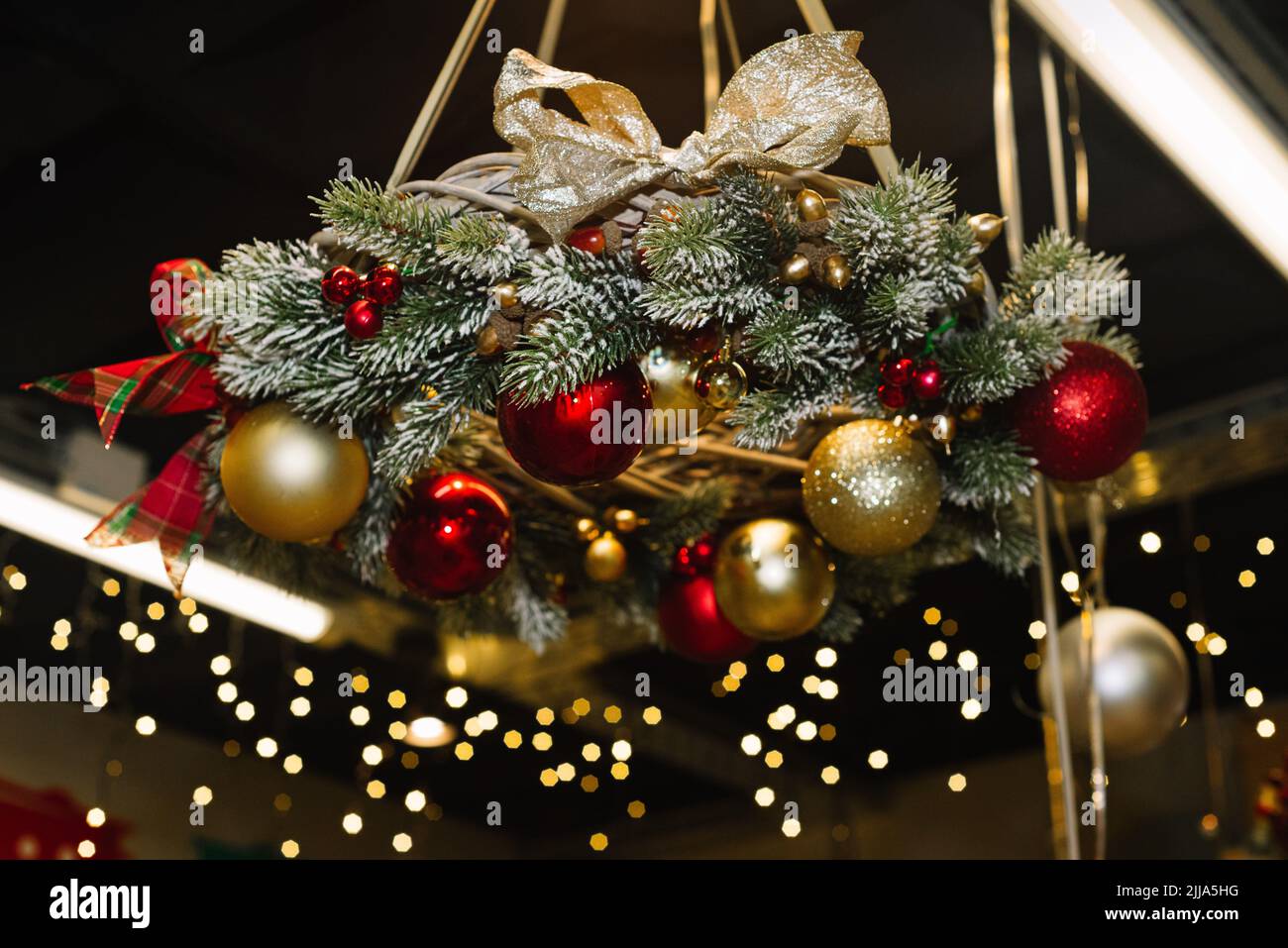 Christmas decorations, a sprig of pine tree tied in a wreath, decorated ...
