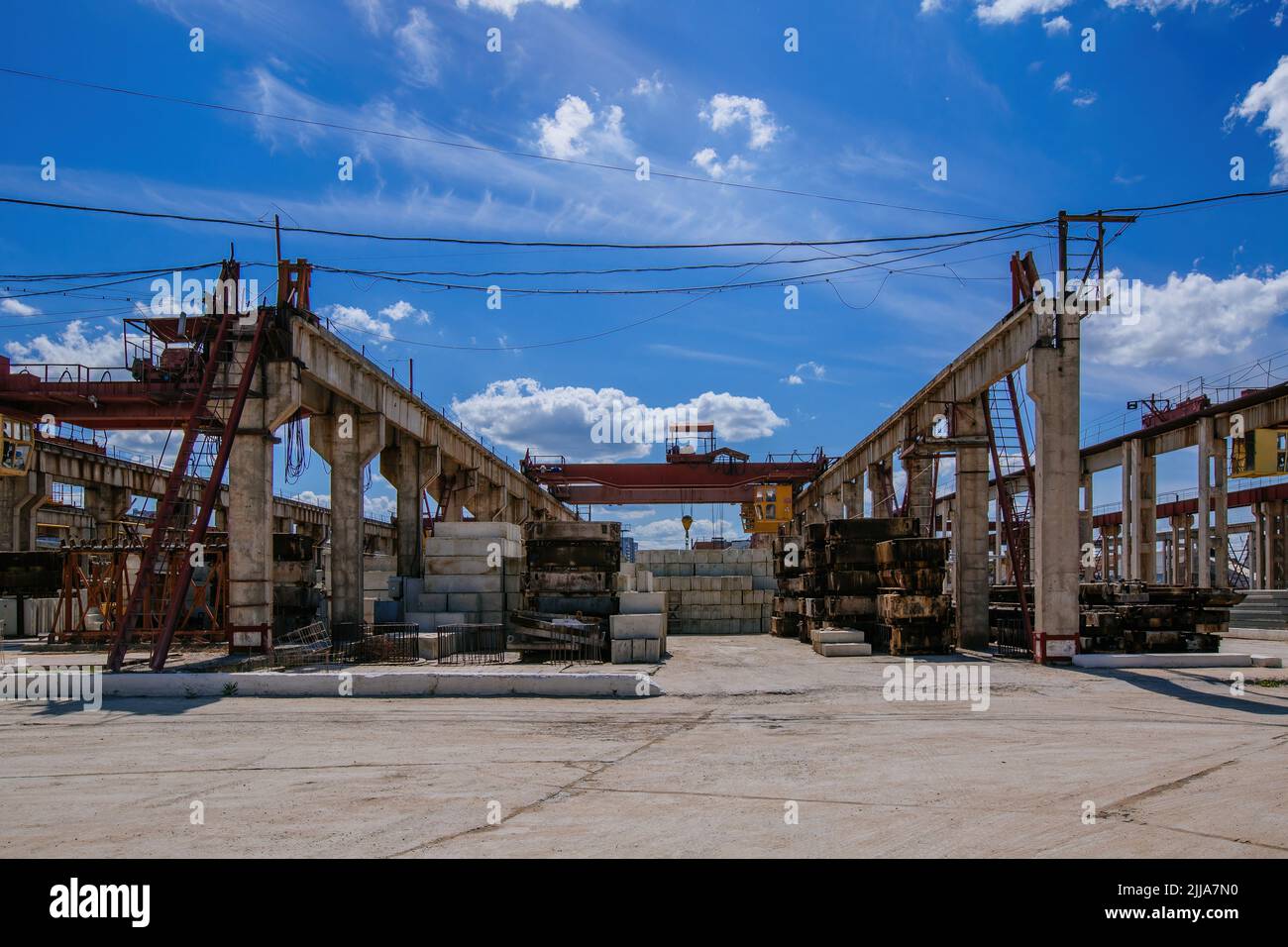 Territory of reinforced concrete factory Stock Photo - Alamy