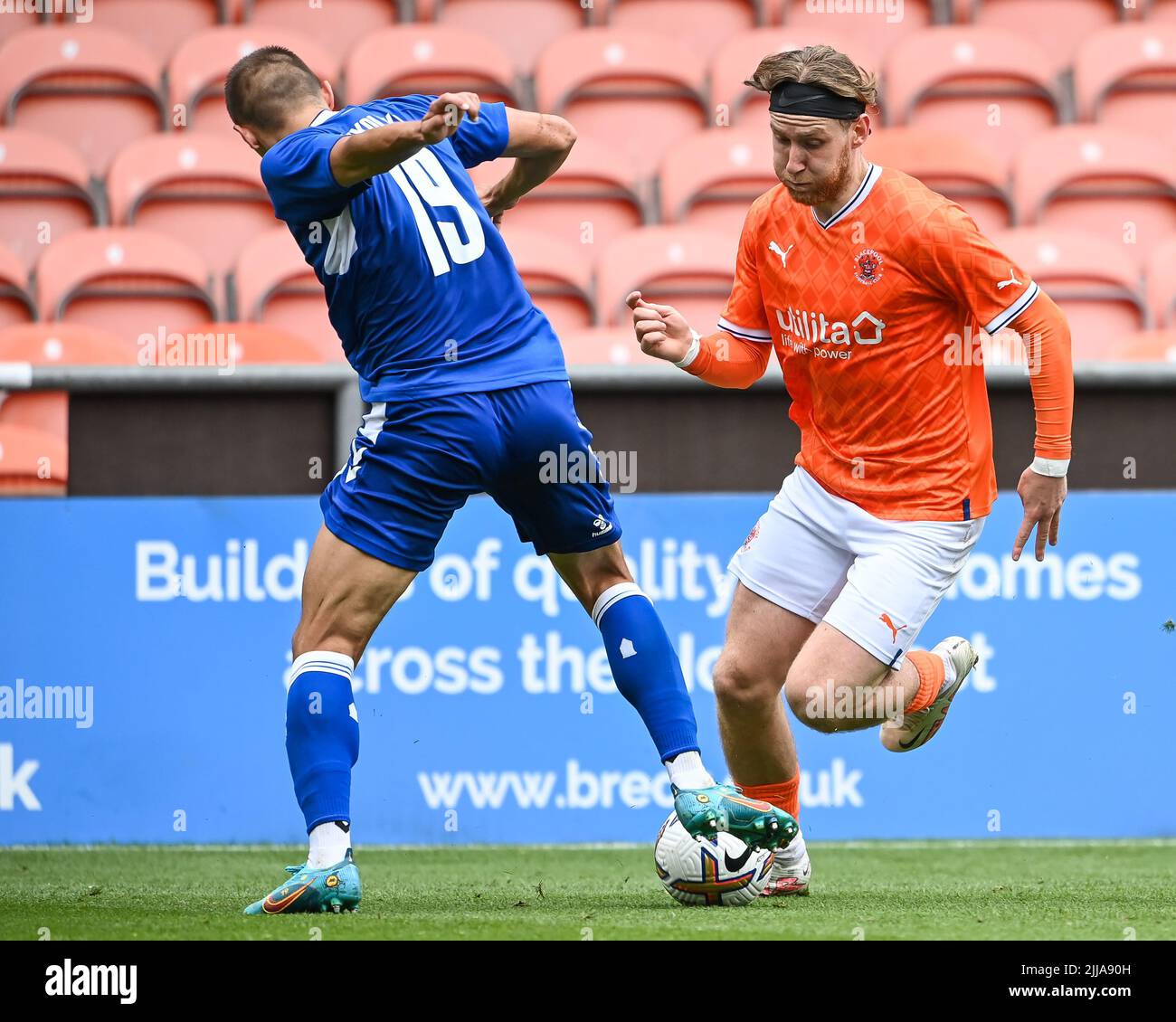 Josh Bowler #11 of Blackpool makes a break with the ball Stock Photo ...