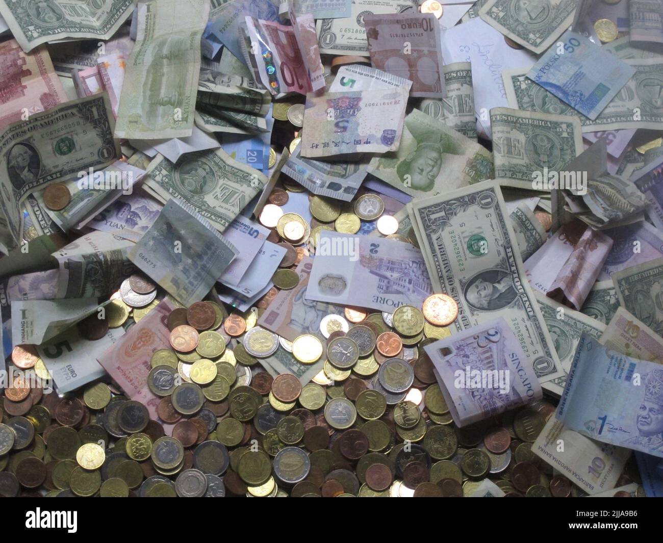 coins and bills Stock Photo - Alamy