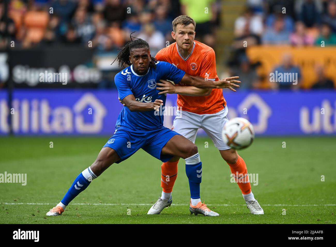 Jordan Thorniley #34 of Blackpool and Alex Iwobi #17 of Everton battle ...