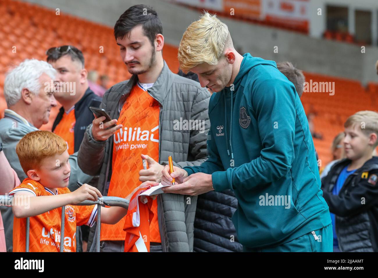 Anthony Gordon #10 of Everton signs an autograph for a young fan Stock ...