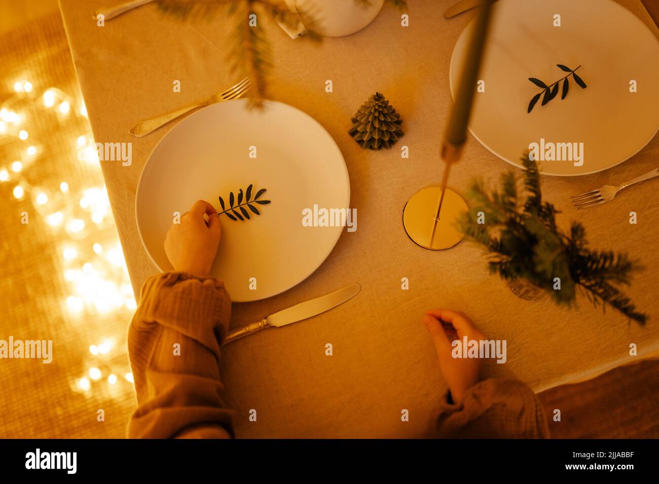Christmas decor in the setting of a festive table for lunch or dinner ...