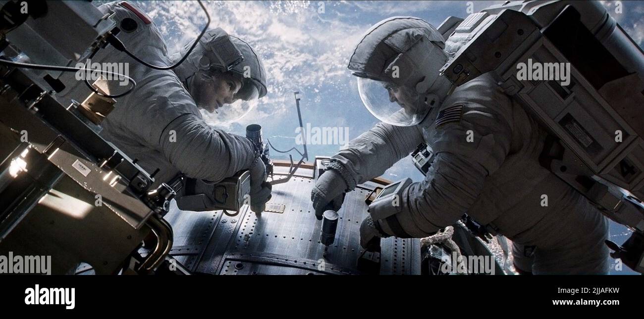 SANDRA BULLOCK, GEORGE CLOONEY, GRAVITY, 2013 Stock Photo - Alamy