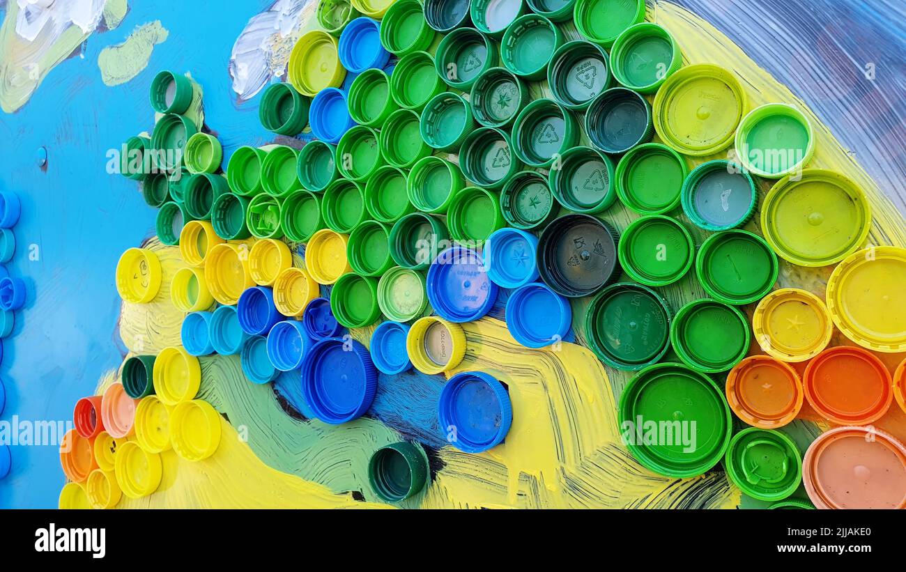 A mosaic recycle art with plastic caps Stock Photo - Alamy