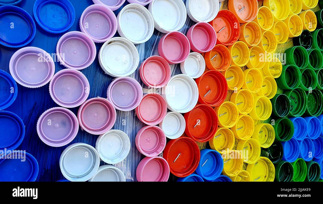 A mosaic recycle art with plastic caps Stock Photo - Alamy
