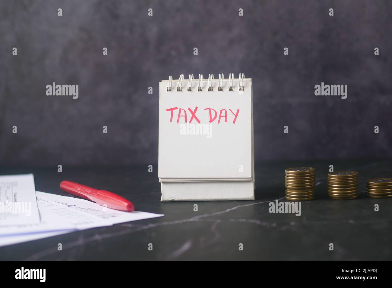 Tax return form and hand written tax due on table Stock Photo - Alamy