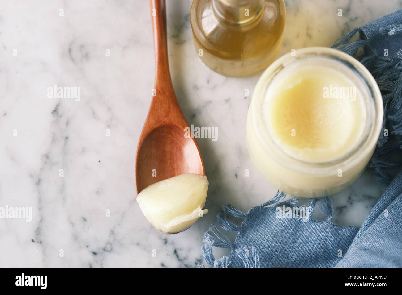 homemade ghee in container on a table Stock Photo - Alamy