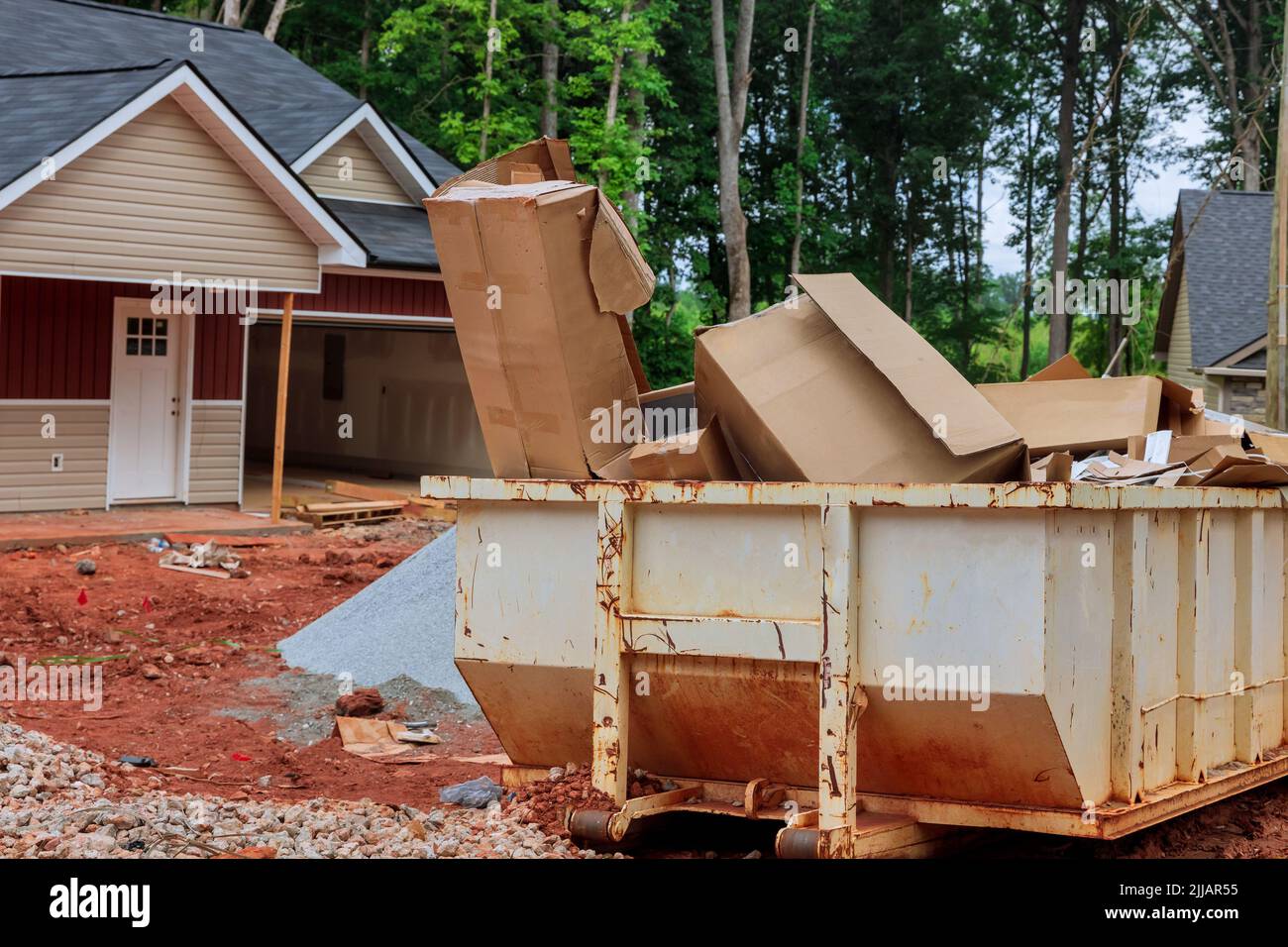 Construction dumpster on street hi-res stock photography and images - Alamy