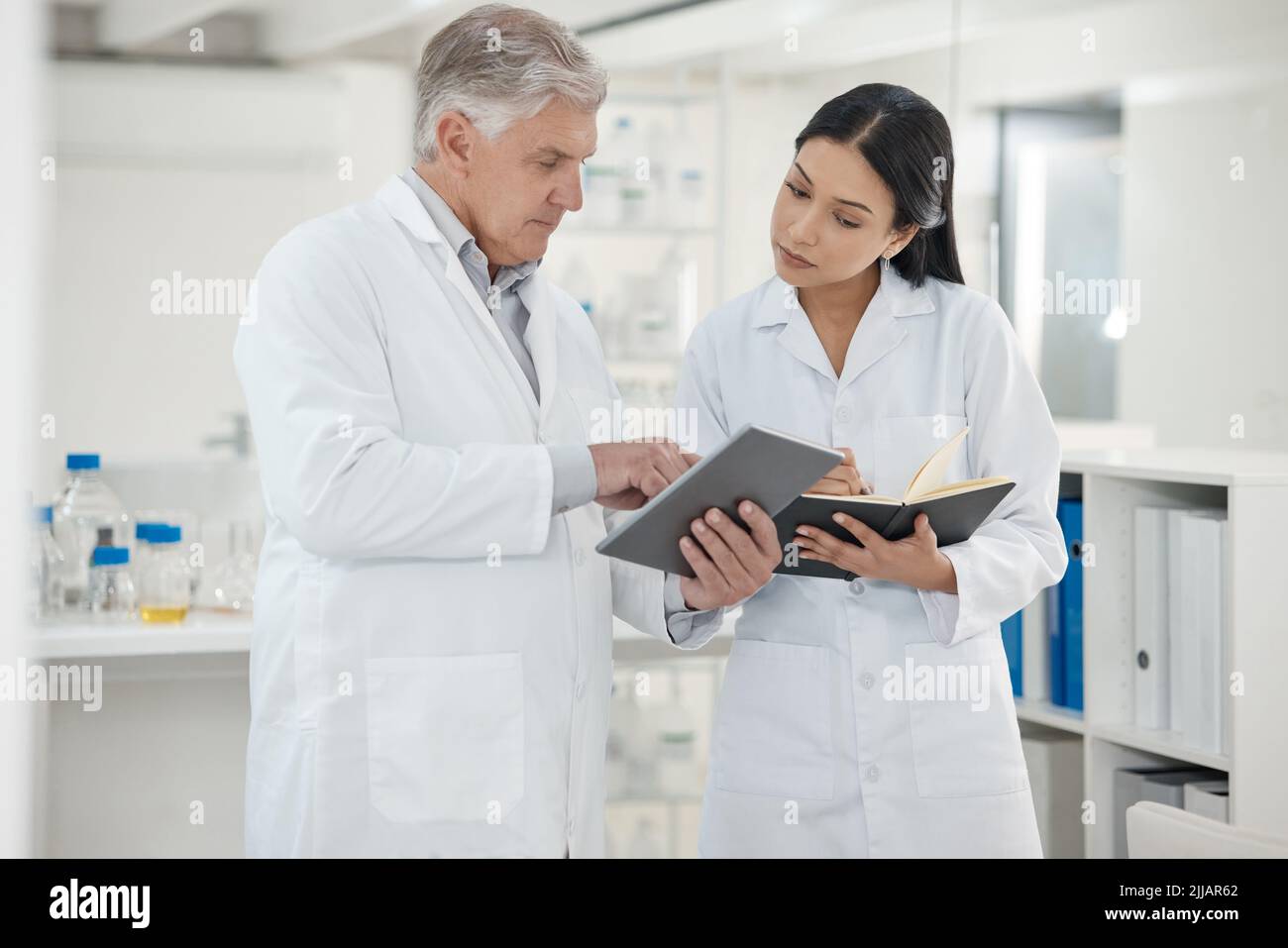 Diverse team medical scientists solve hi-res stock photography and ...