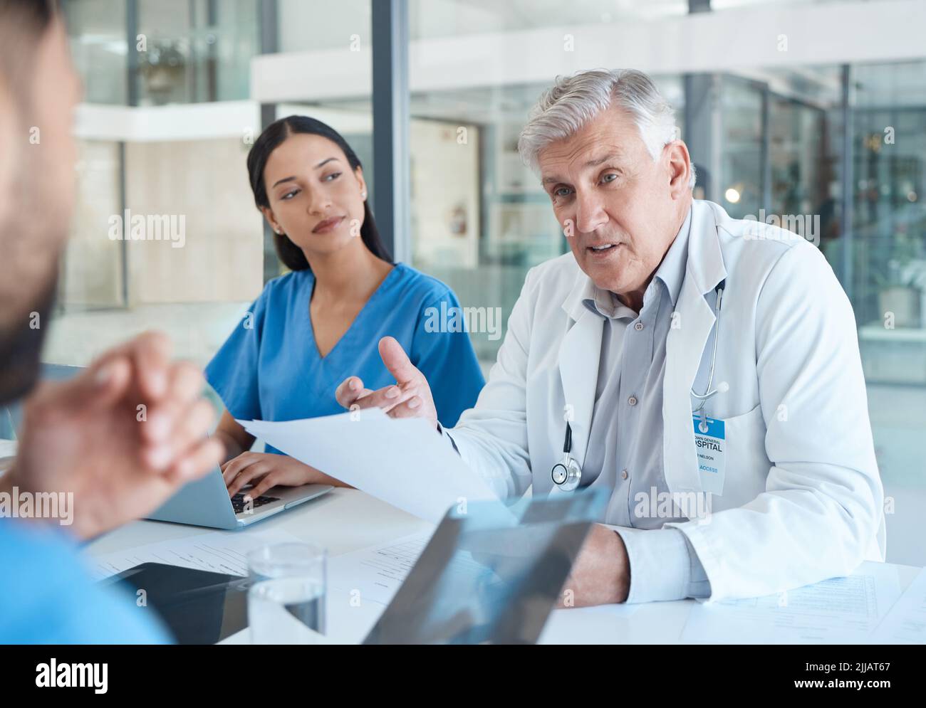 We need to spend more time on this. a group of nurses having a meeting ...