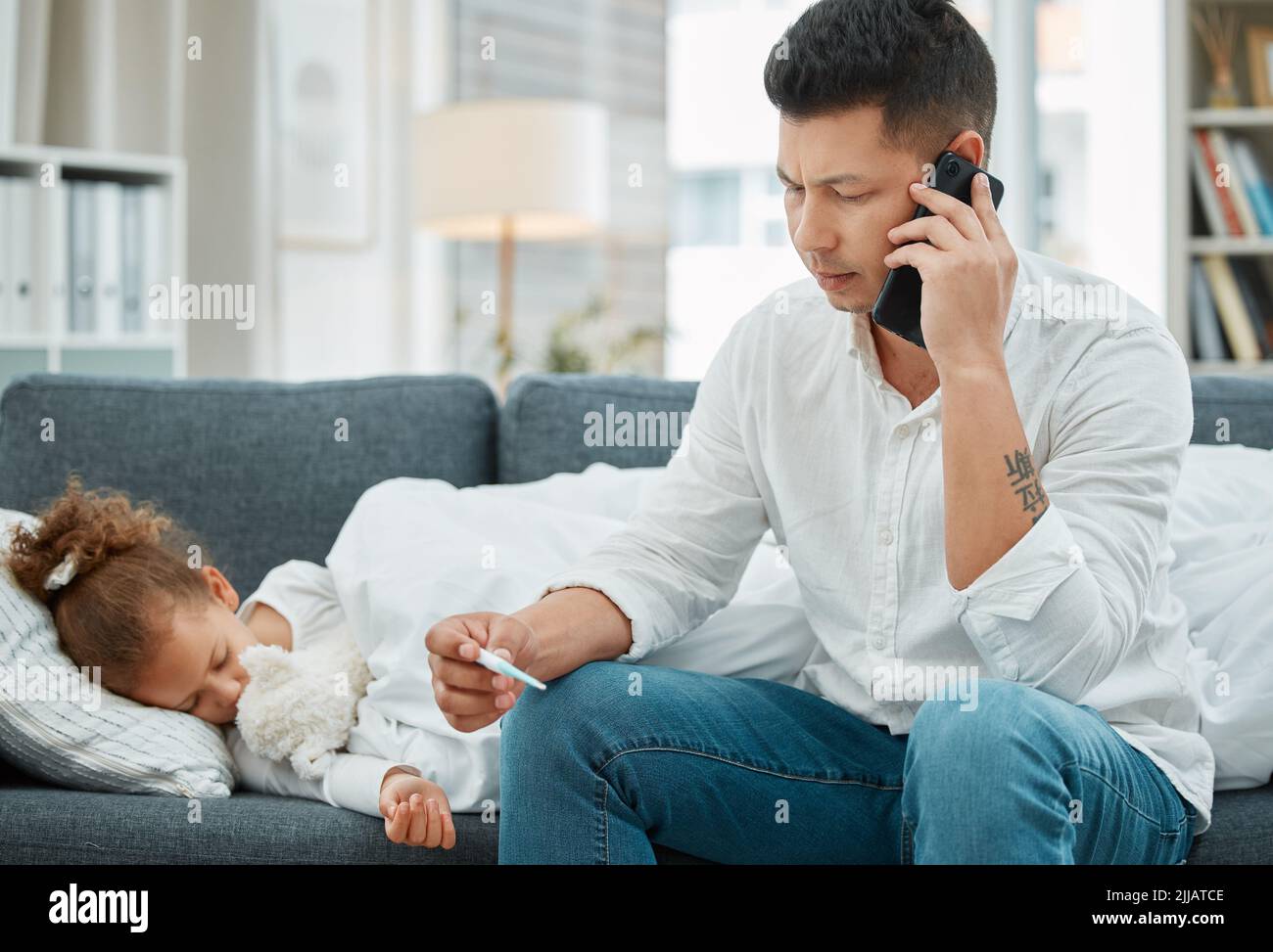 The numbers have been increasing. a father calling the doctor for his ...