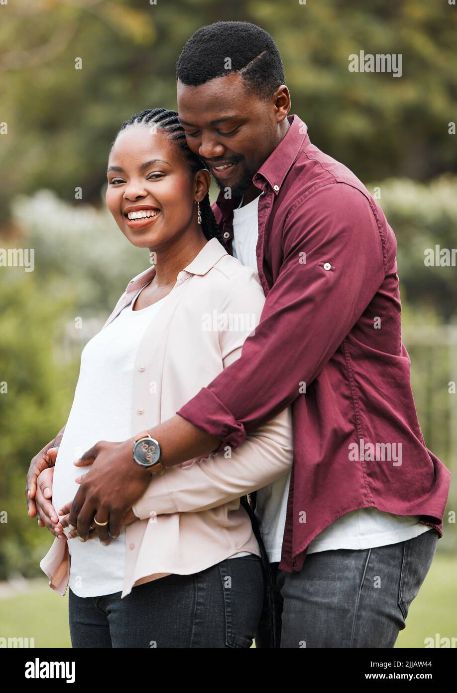 Giving our offspring the best life. a young expecting couple posing ...