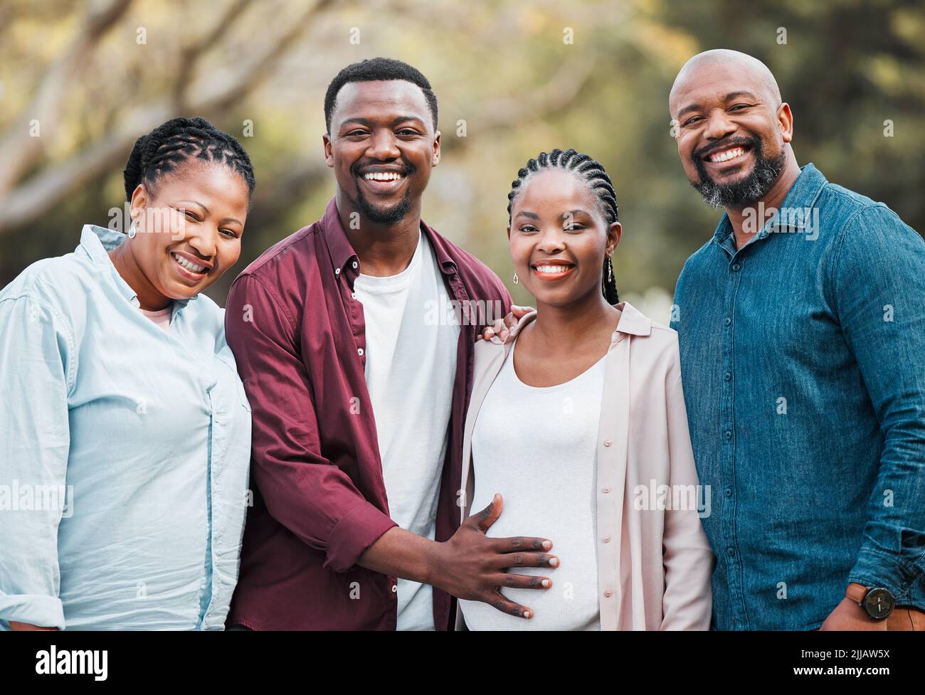 Growing family by one more member. a family celebrating their daughter ...