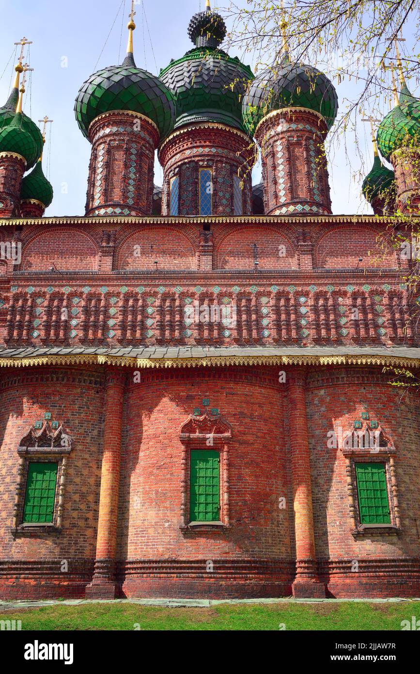 The Church of John the Baptist. Brick facade with colored tiles, a ...