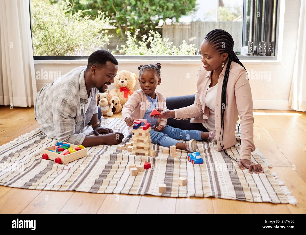 Girl and woman playing with blocks hi-res stock photography and images ...