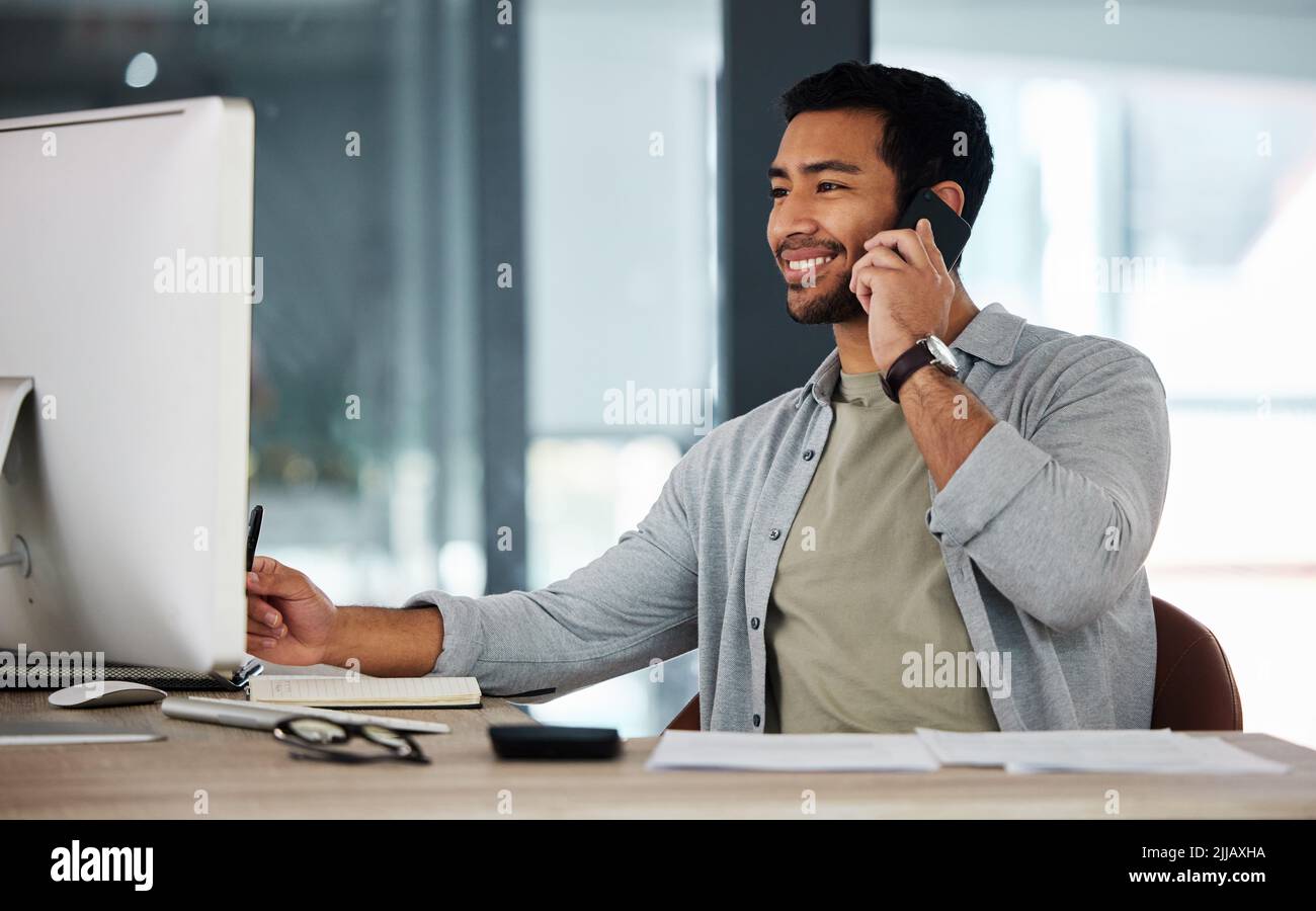 Were ready to do our best. a young businessman making a phone call ...