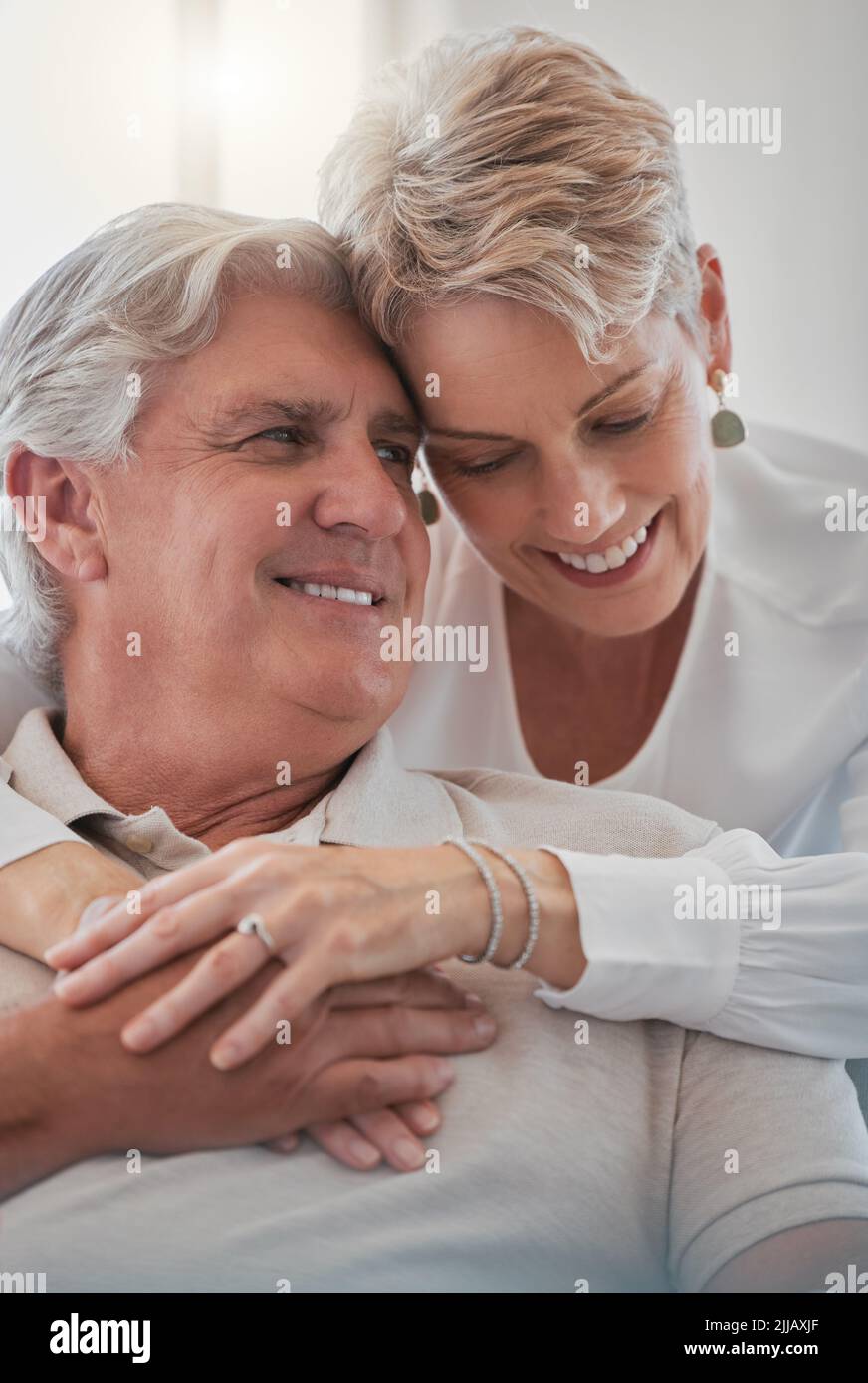 Im so glad I found you. an affectionate senior couple relaxing in their ...