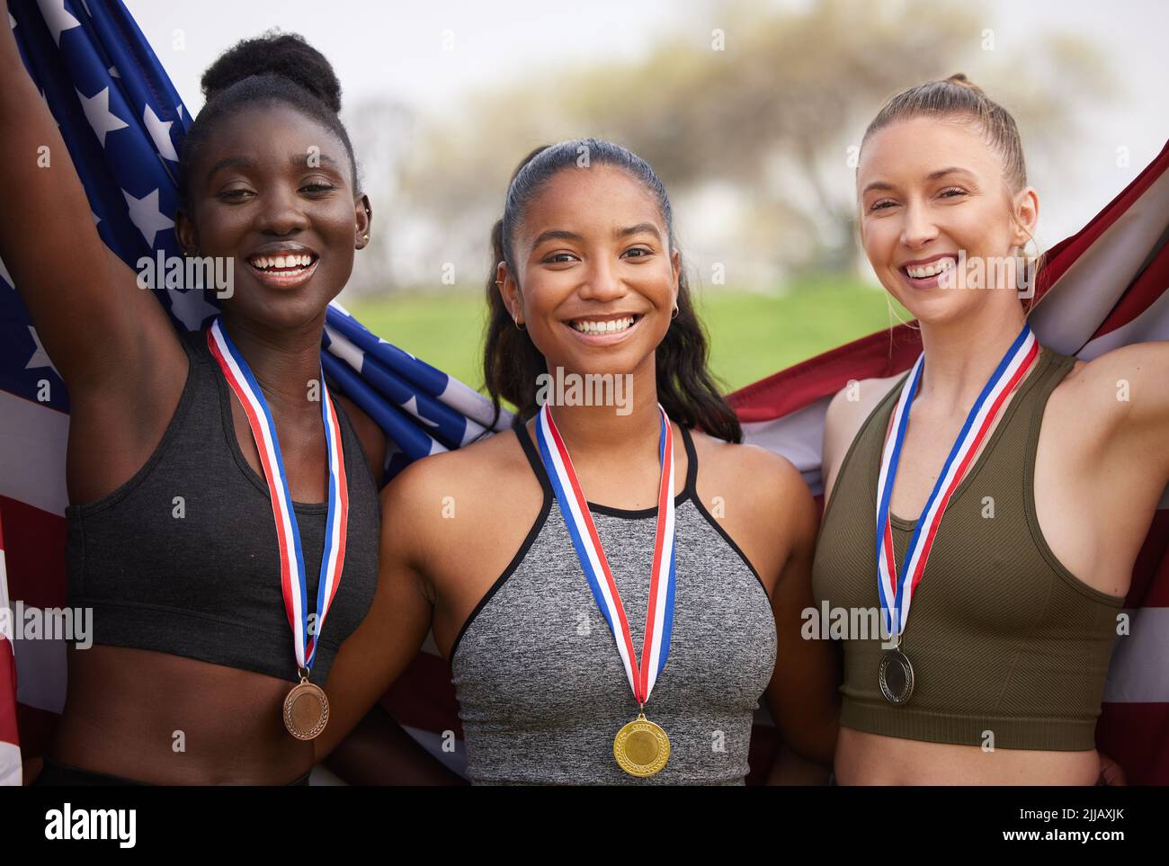 Representing their country. Cropped portrait of three attractive young ...