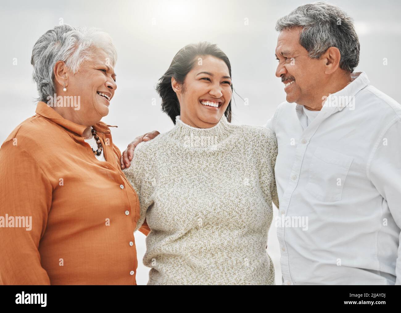 Catching up with her parents. an attractive young woman and her parents ...