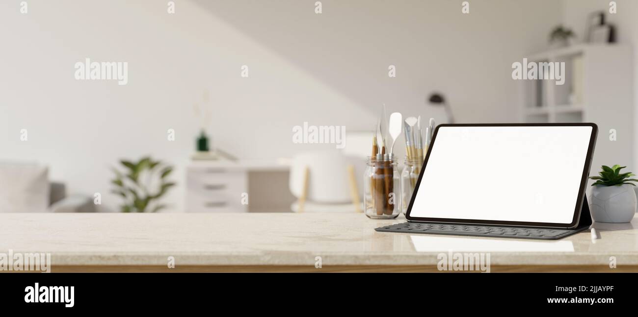 Portable tablet white screen mockup, painting tools and copy space on ...