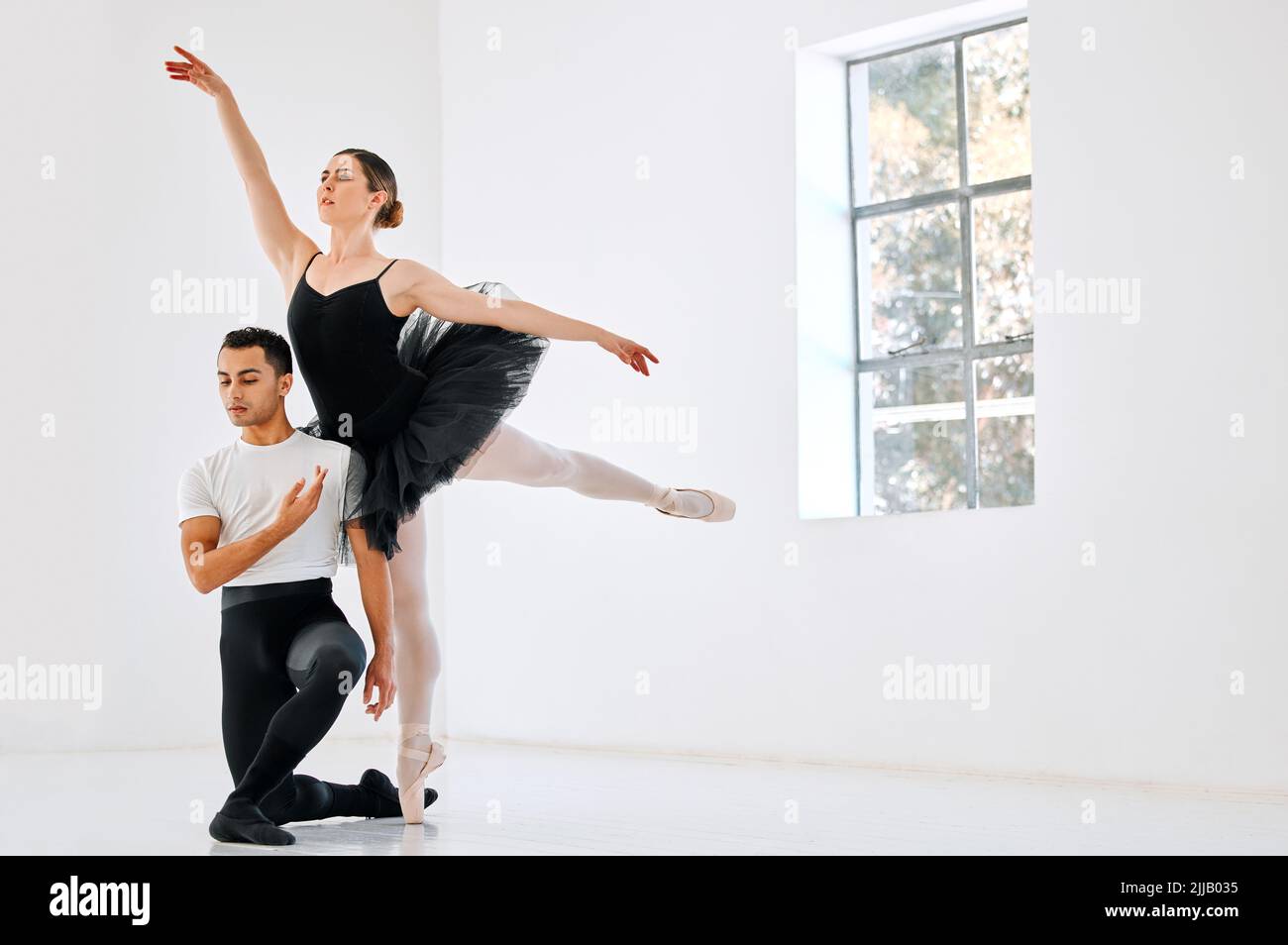 Putting the final touches on their dance routine. Full length shot of ...