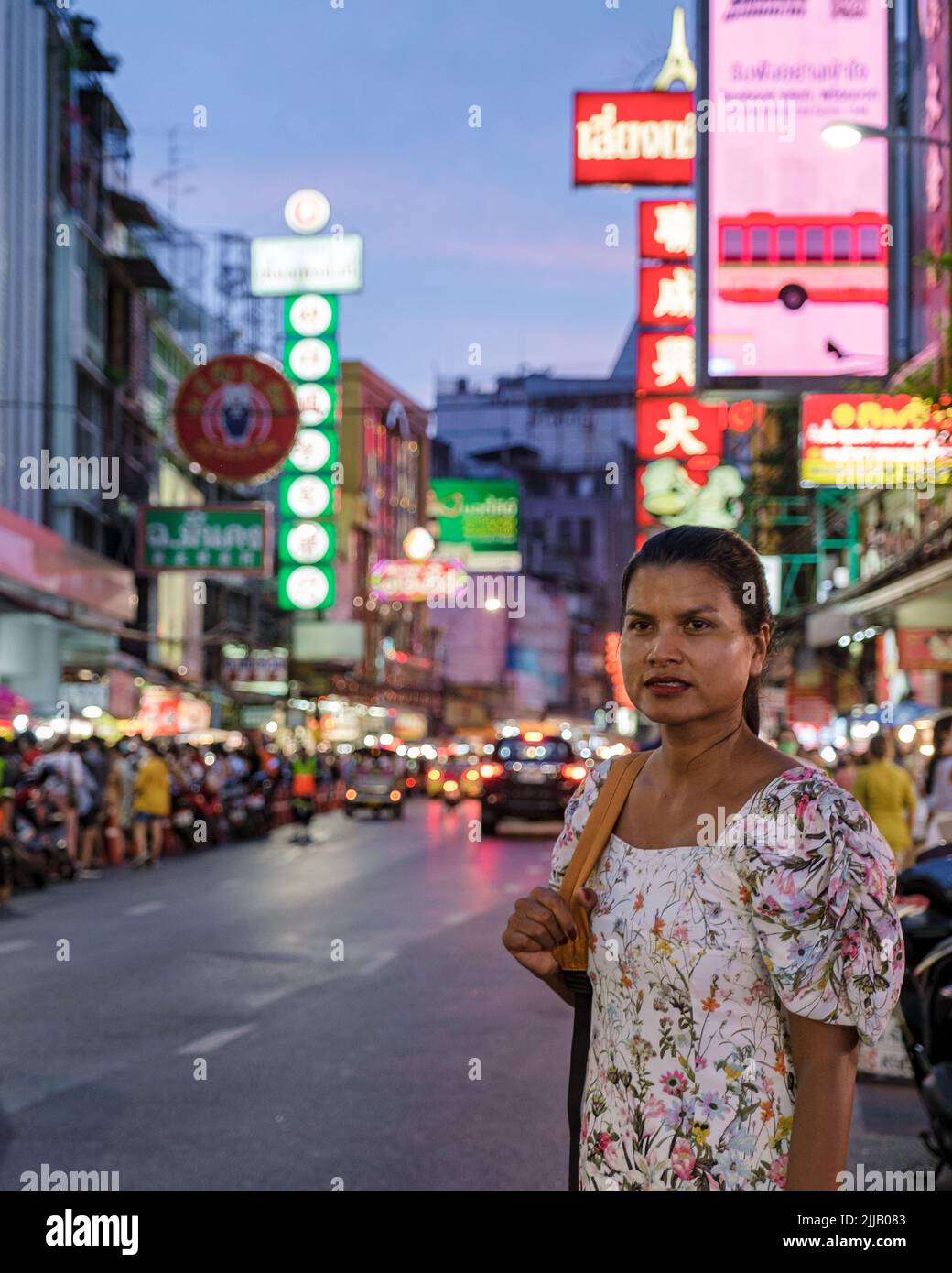China town Bangkok Thailand, colorful streets of China Town Bangkok.Asian woman with bag ...