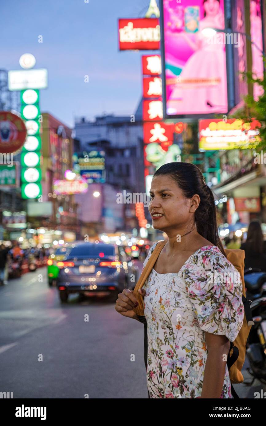 China town Bangkok Thailand, colorful streets of China Town Bangkok.Asian woman with bag ...