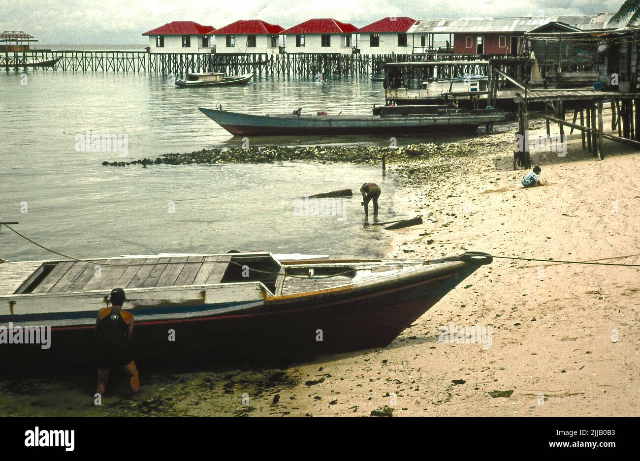 A view of a beach at a fishing village, in a background of beach ...