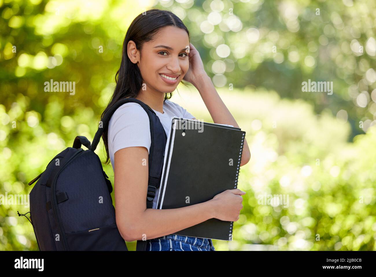 Its a good day on campus. Cropped portrait of an attractive young ...
