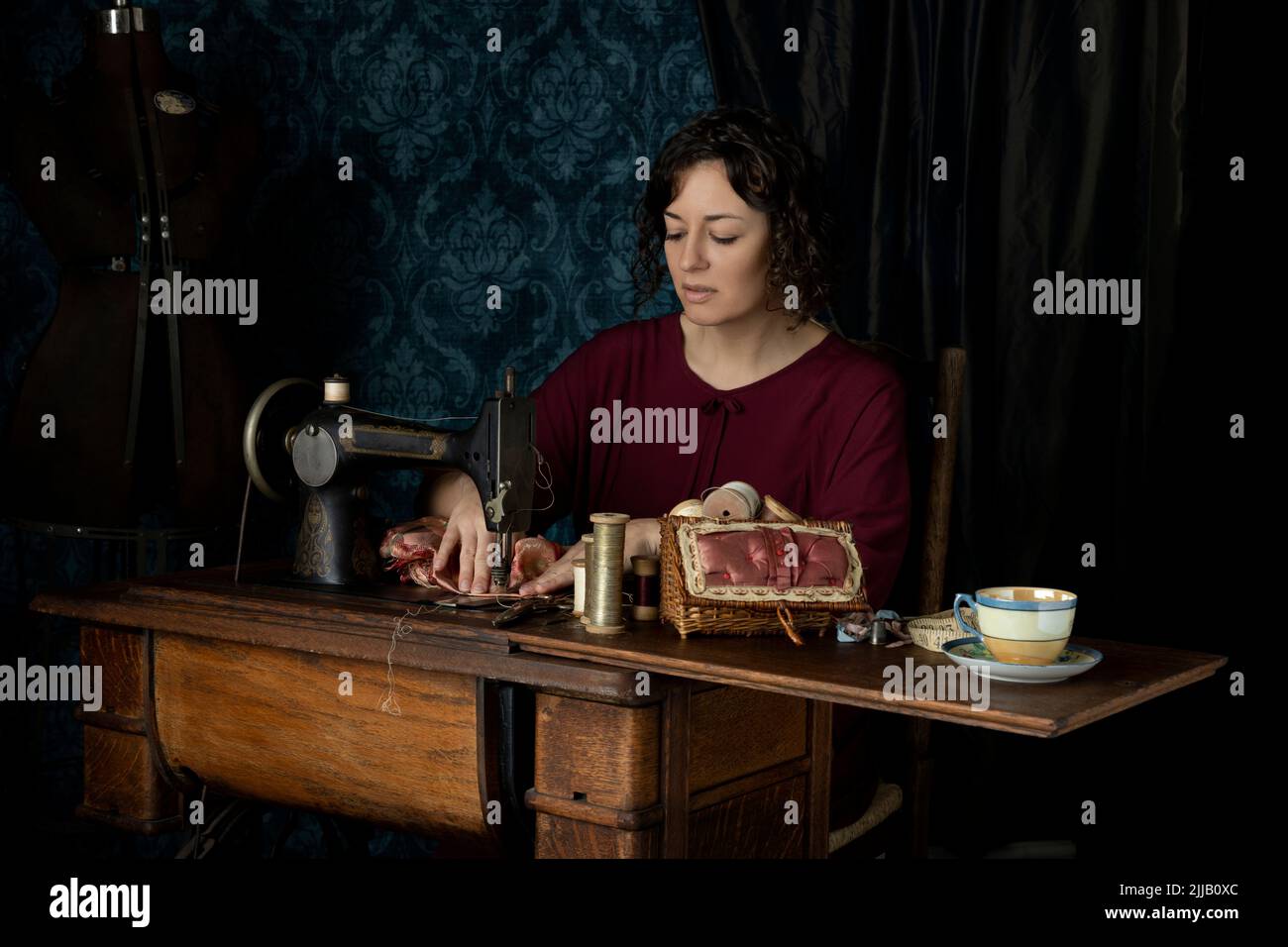 1920s woman sewing hi-res stock photography and images - Alamy
