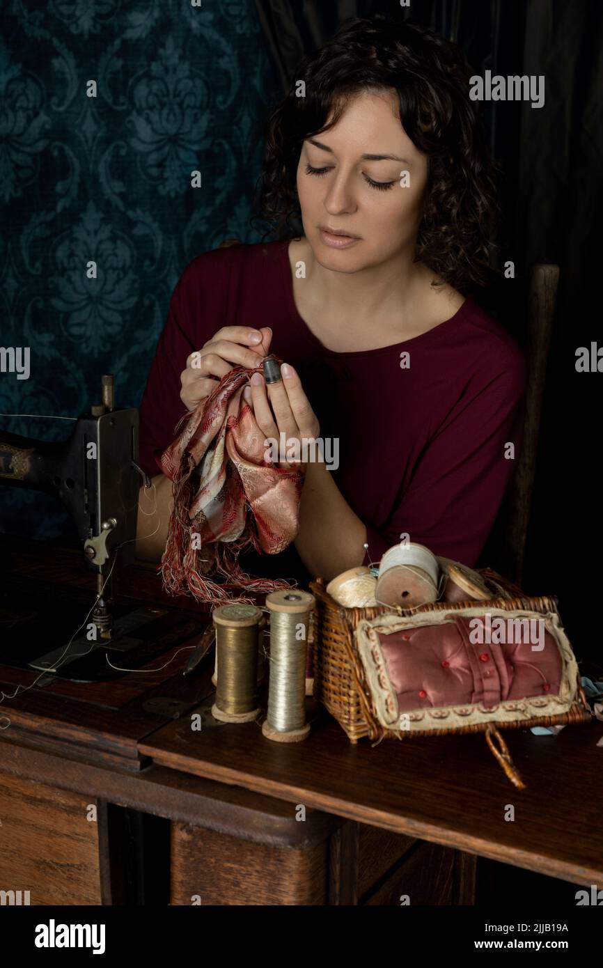 1920s woman sewing hi-res stock photography and images - Alamy